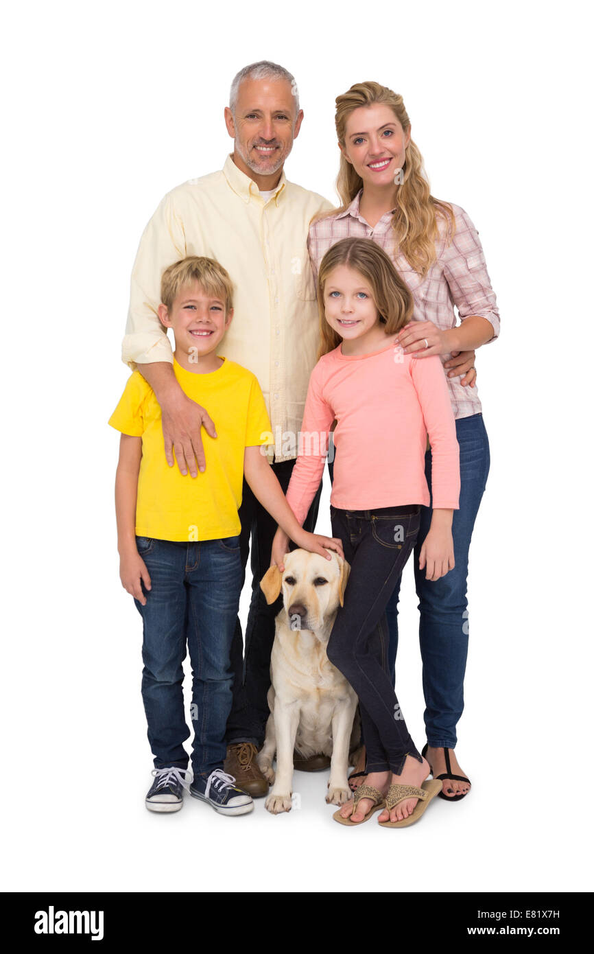 Happy family with their pet dog Stock Photo - Alamy