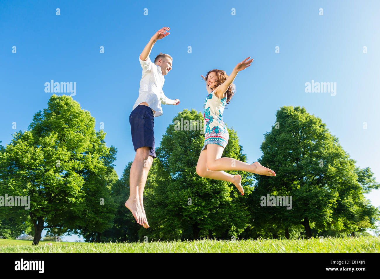 Jumping enjoying man hi-res stock photography and images - Alamy