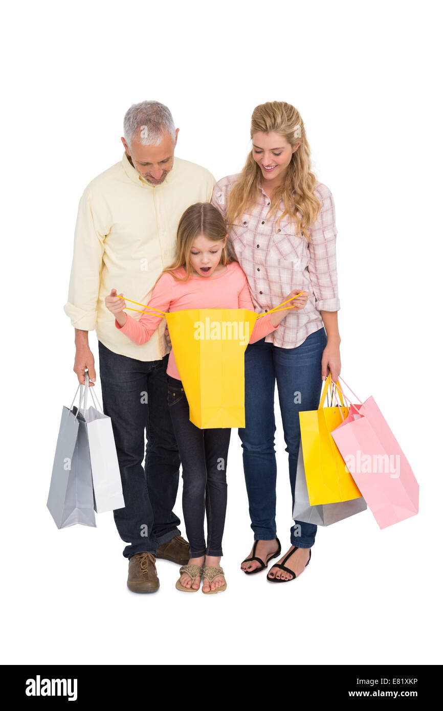 Parents and daughter with shopping bags Stock Photo - Alamy