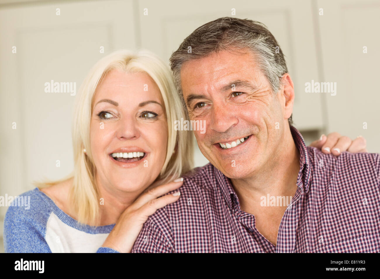 Happy mature couple smiling together Stock Photo - Alamy