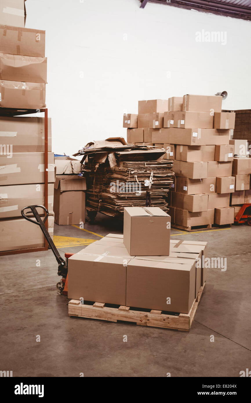Cardboard boxes in warehouse Stock Photo - Alamy