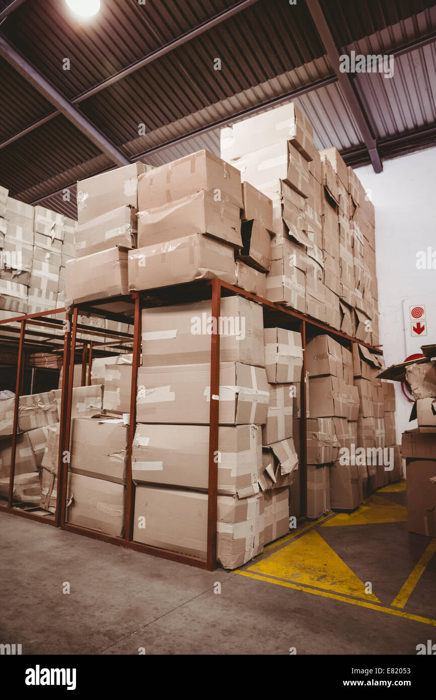 Cardboard boxes in warehouse Stock Photo - Alamy