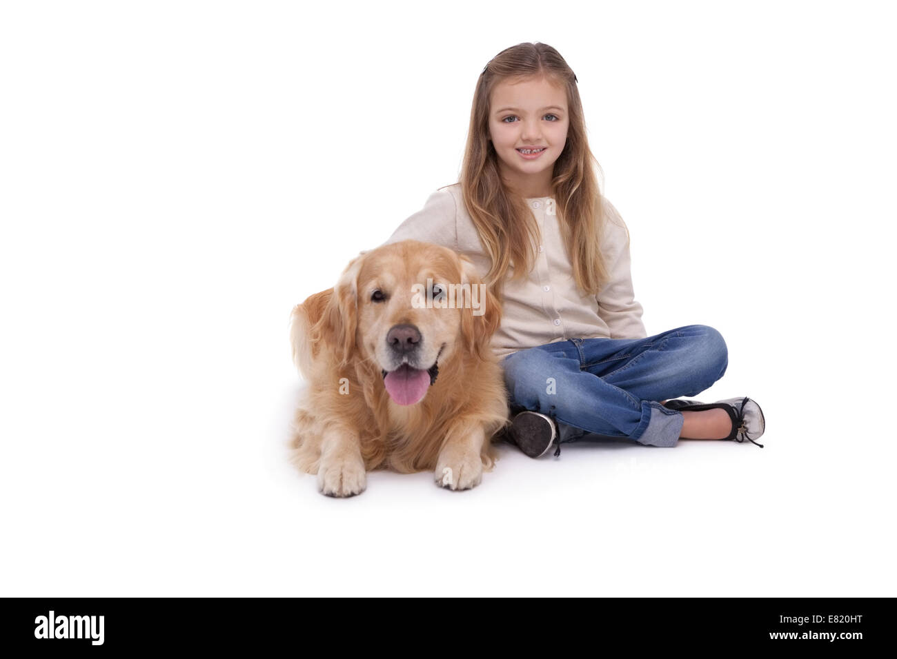 Girl sitting beside her pet dog Stock Photo - Alamy