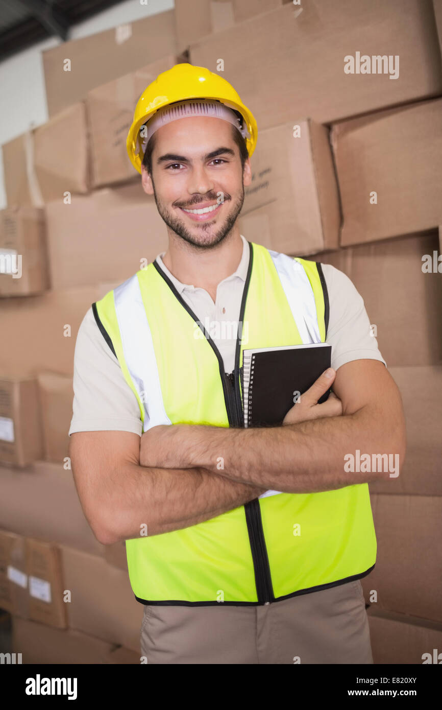 Portrait of worker in warehouse Stock Photo - Alamy