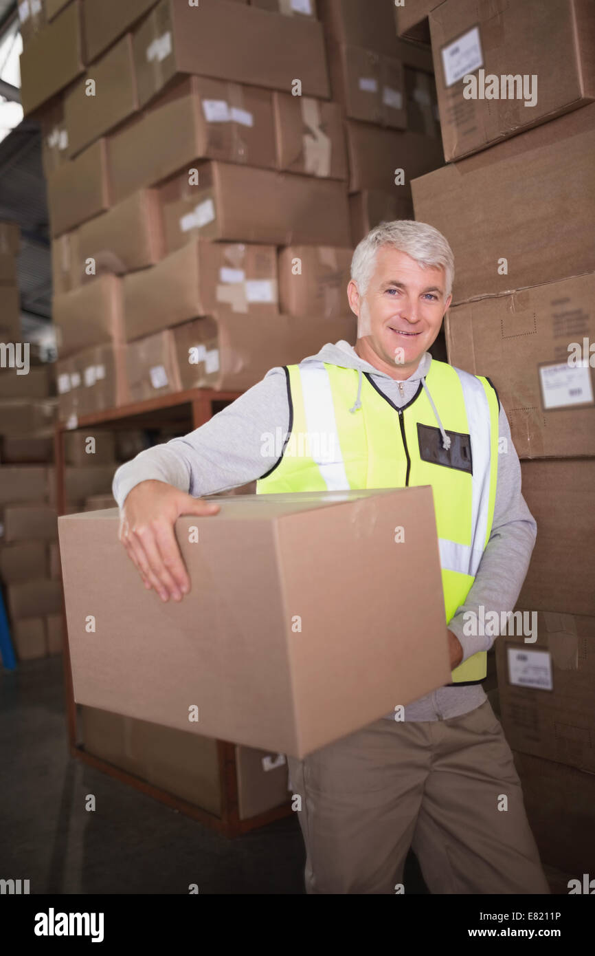 Portrait factory carrying cardboard boxes hi-res stock photography and ...