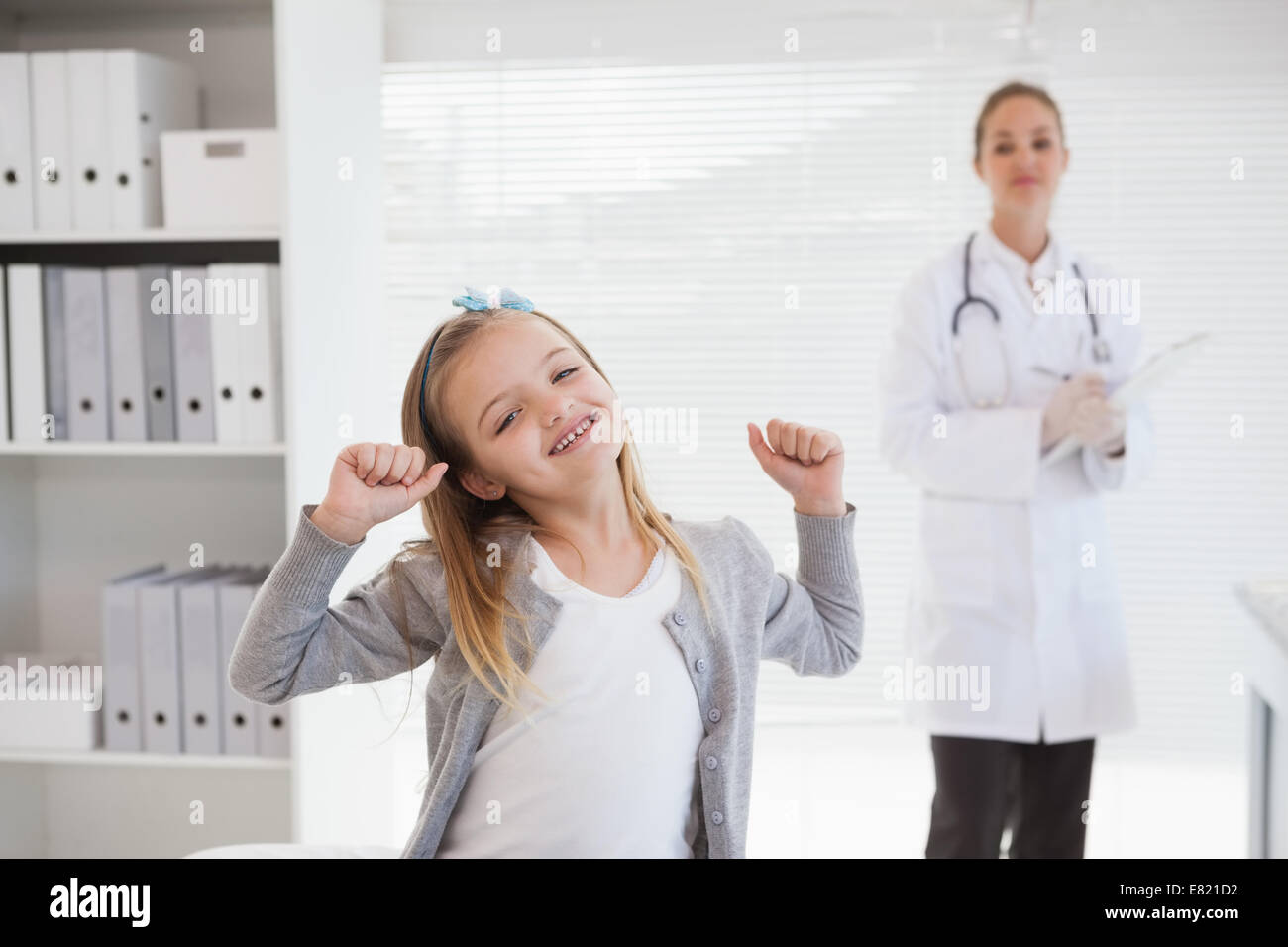 Smiling patient at the doctors Stock Photo - Alamy