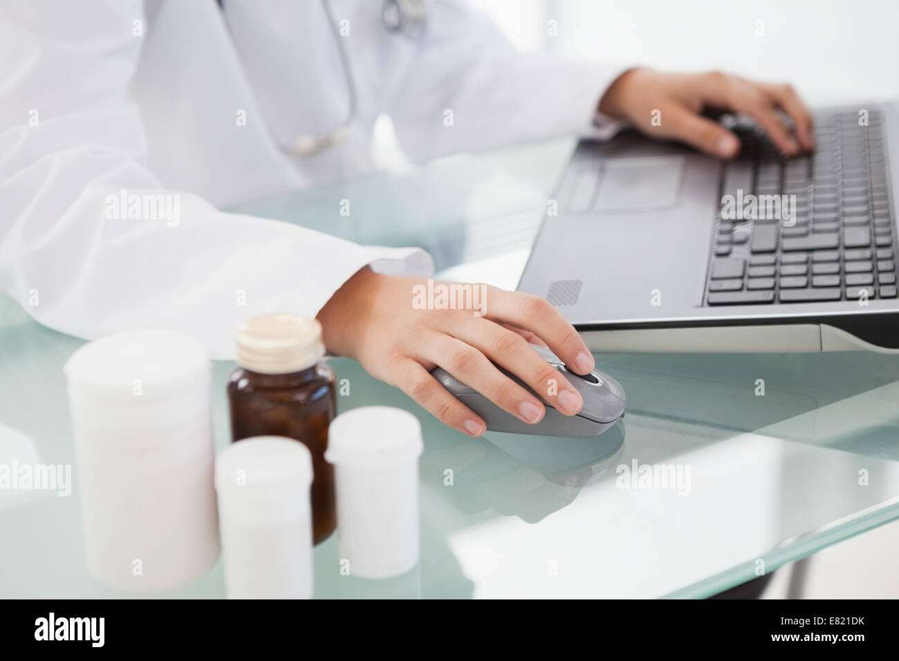 Doctor typing patient hi-res stock photography and images - Alamy