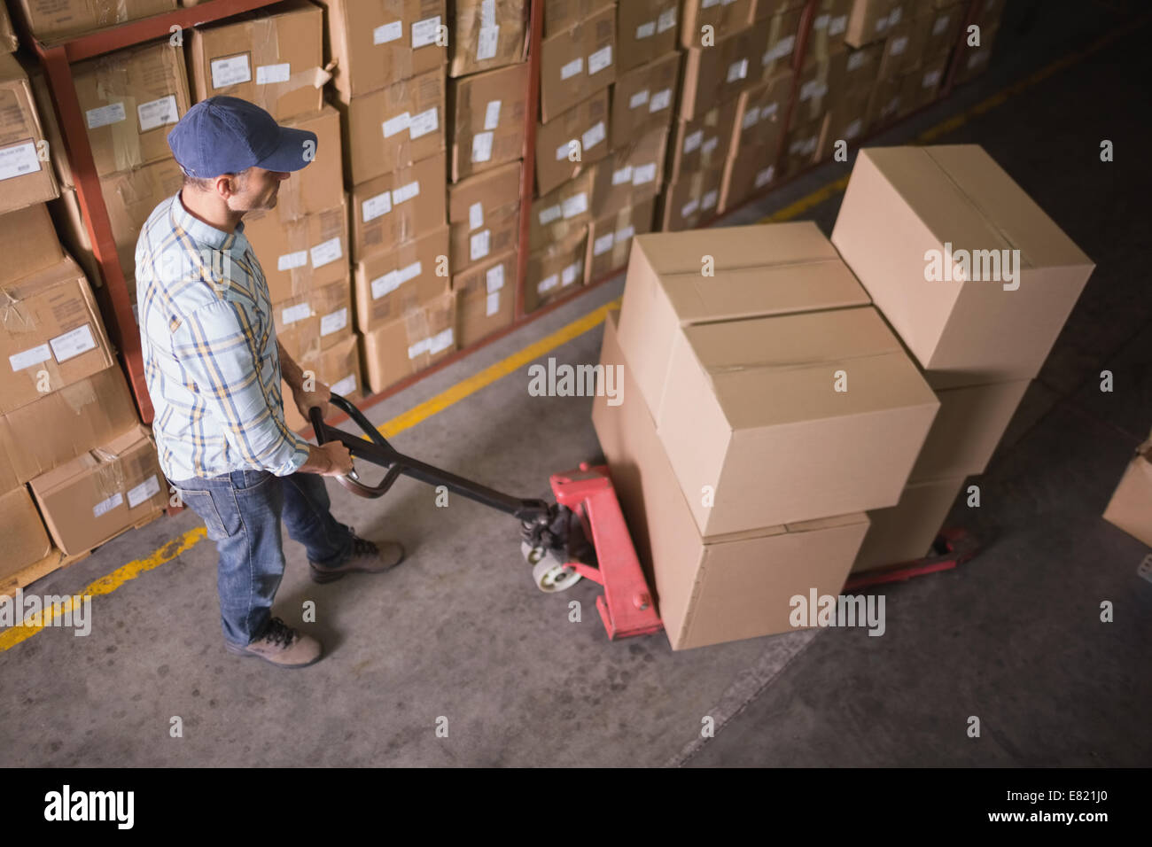 Warehouse pushing trolley hi-res stock photography and images - Alamy