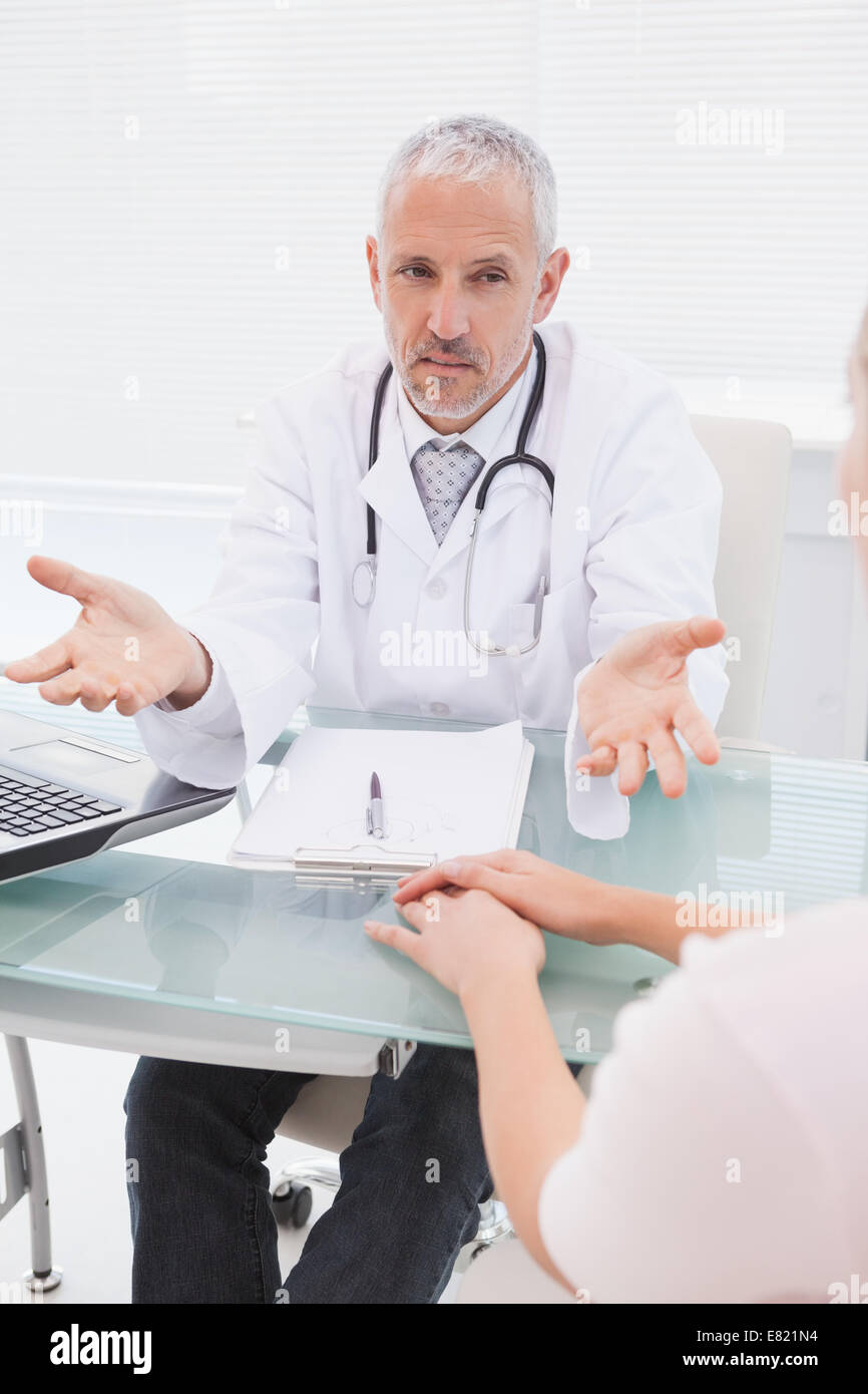 Doctor explaining patient hi-res stock photography and images - Alamy