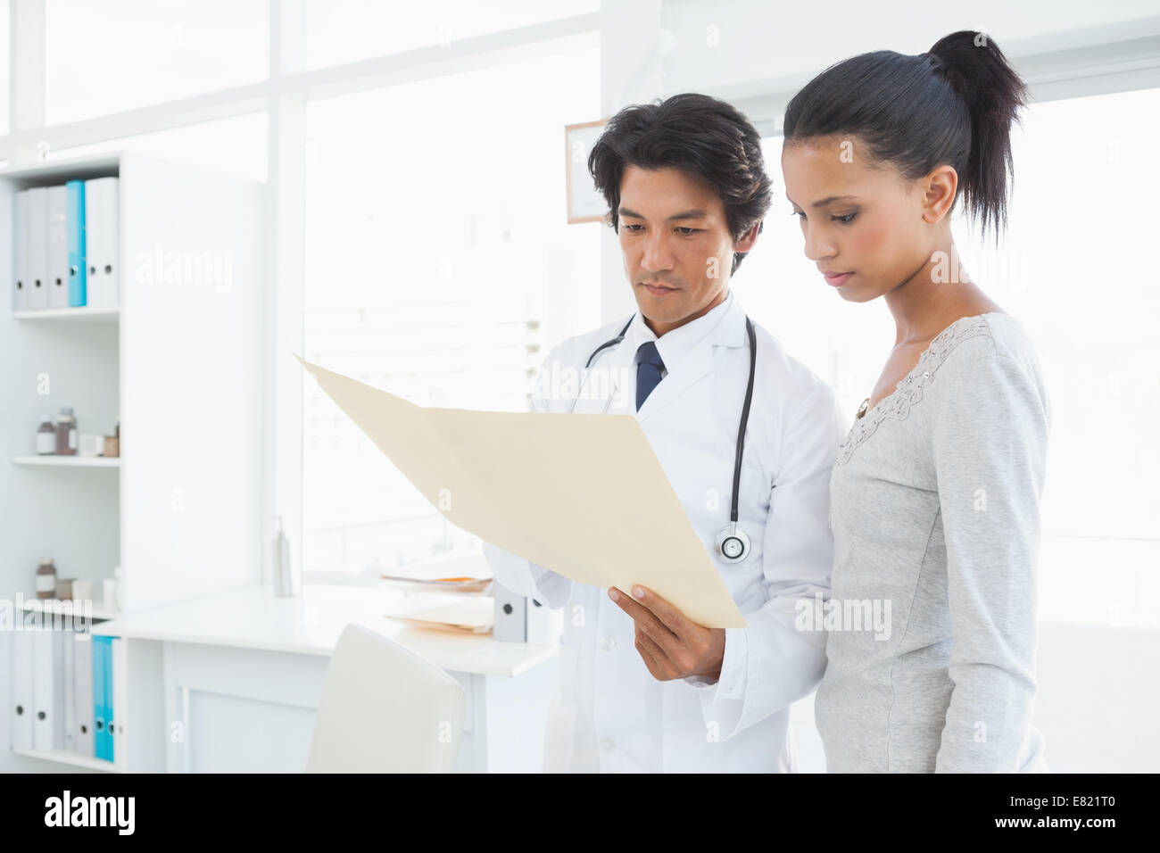 Doctor telling patient her results Stock Photo - Alamy