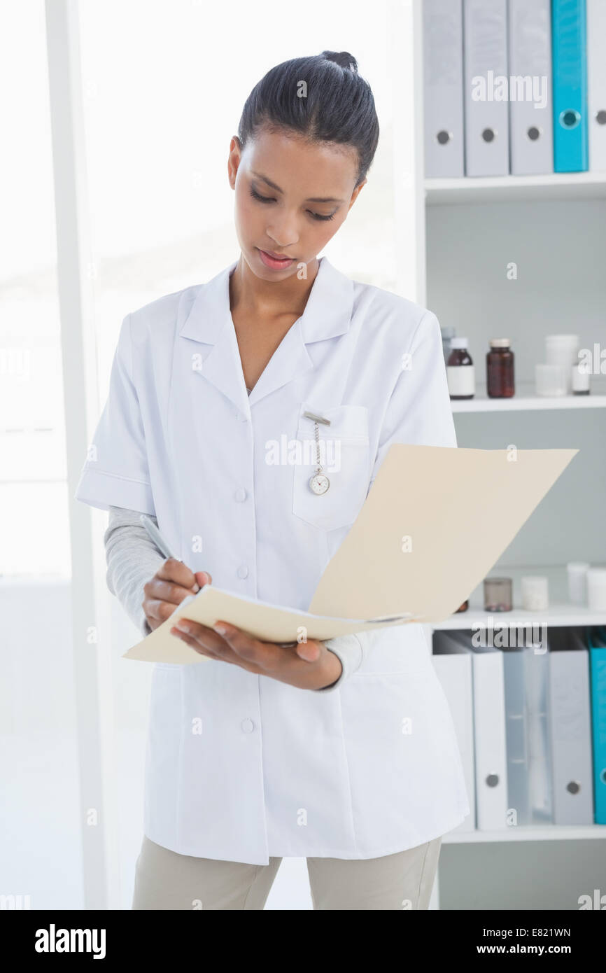 African american woman doctor writing hi-res stock photography and ...