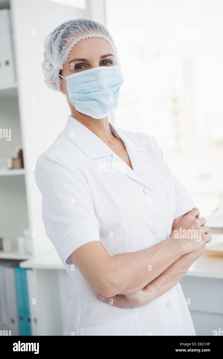 Doctor wearing a surgical mask Stock Photo - Alamy