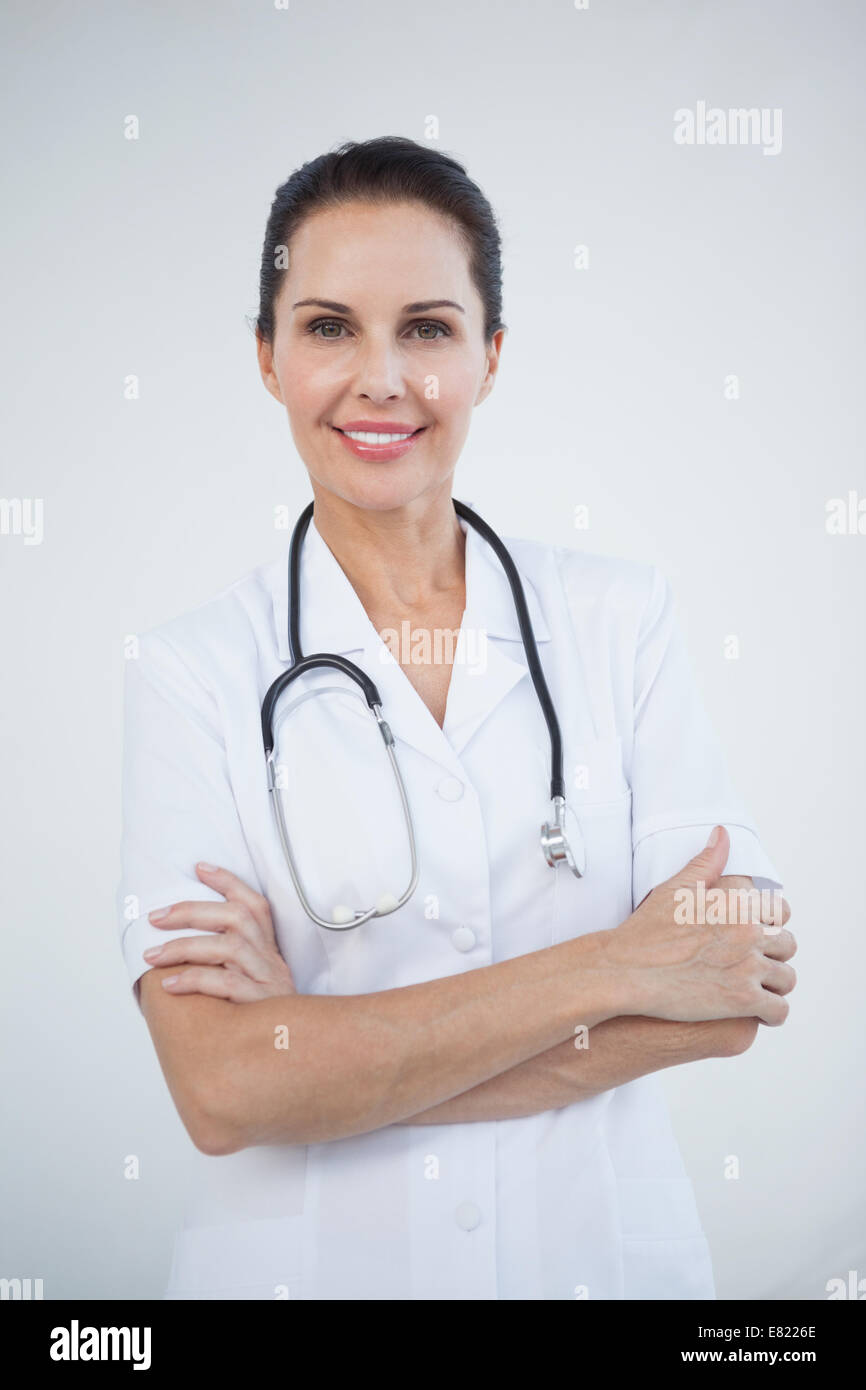 Smiling doctor looking at camera Stock Photo - Alamy