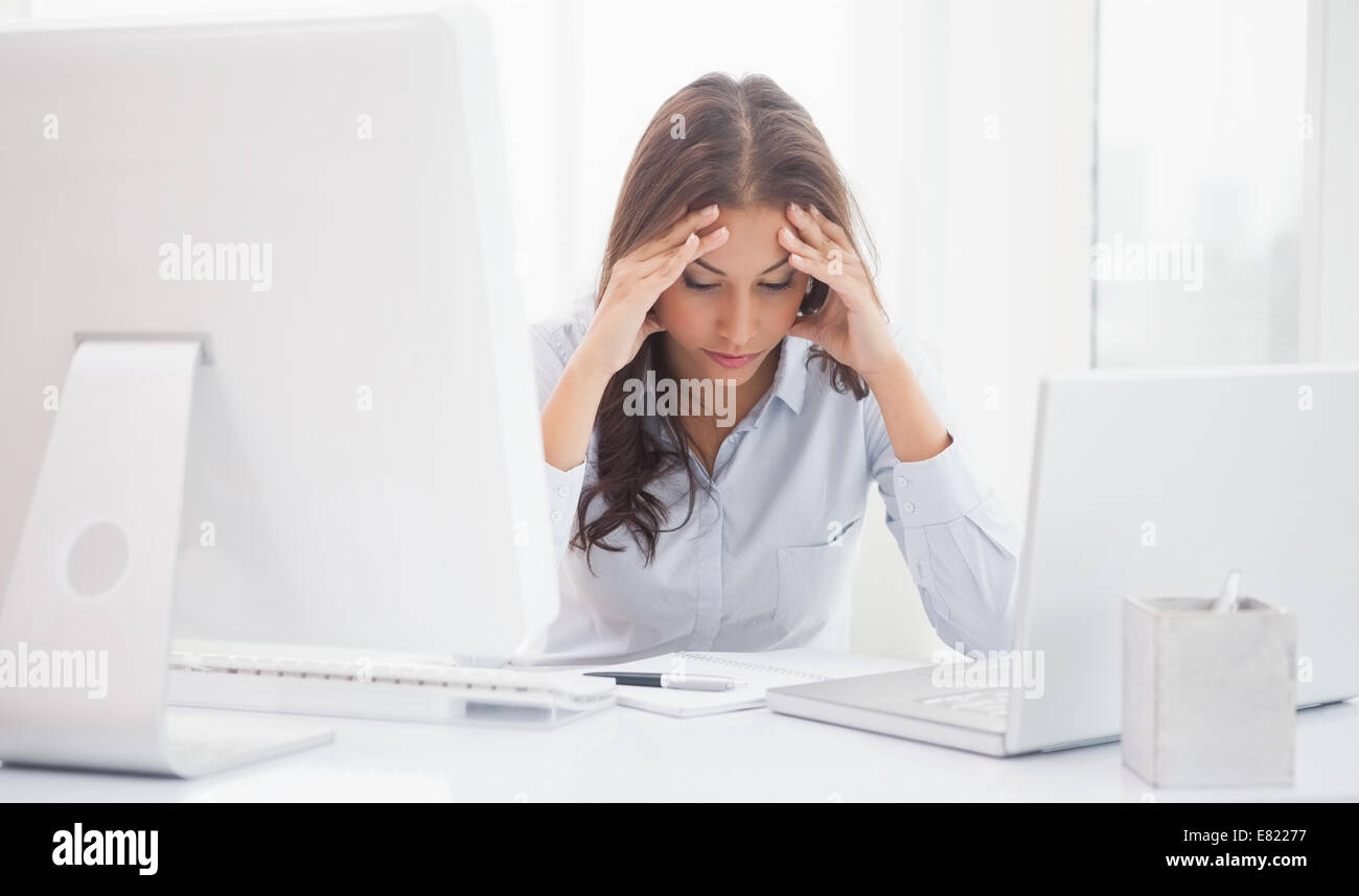 Tired woman sitting desk hi-res stock photography and images - Alamy