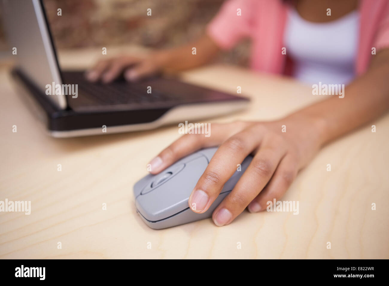 Close up of a hand using a grey mouse Stock Photo - Alamy