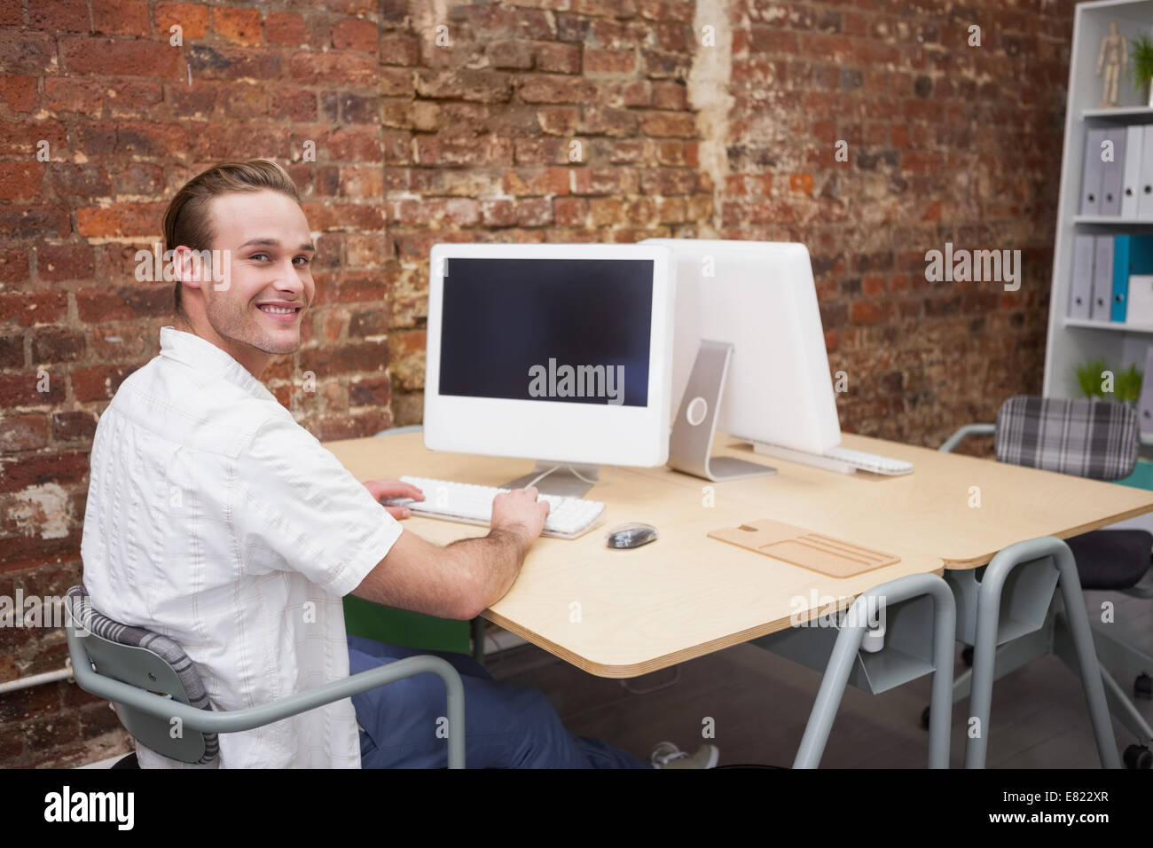 Worker typing hi-res stock photography and images - Alamy