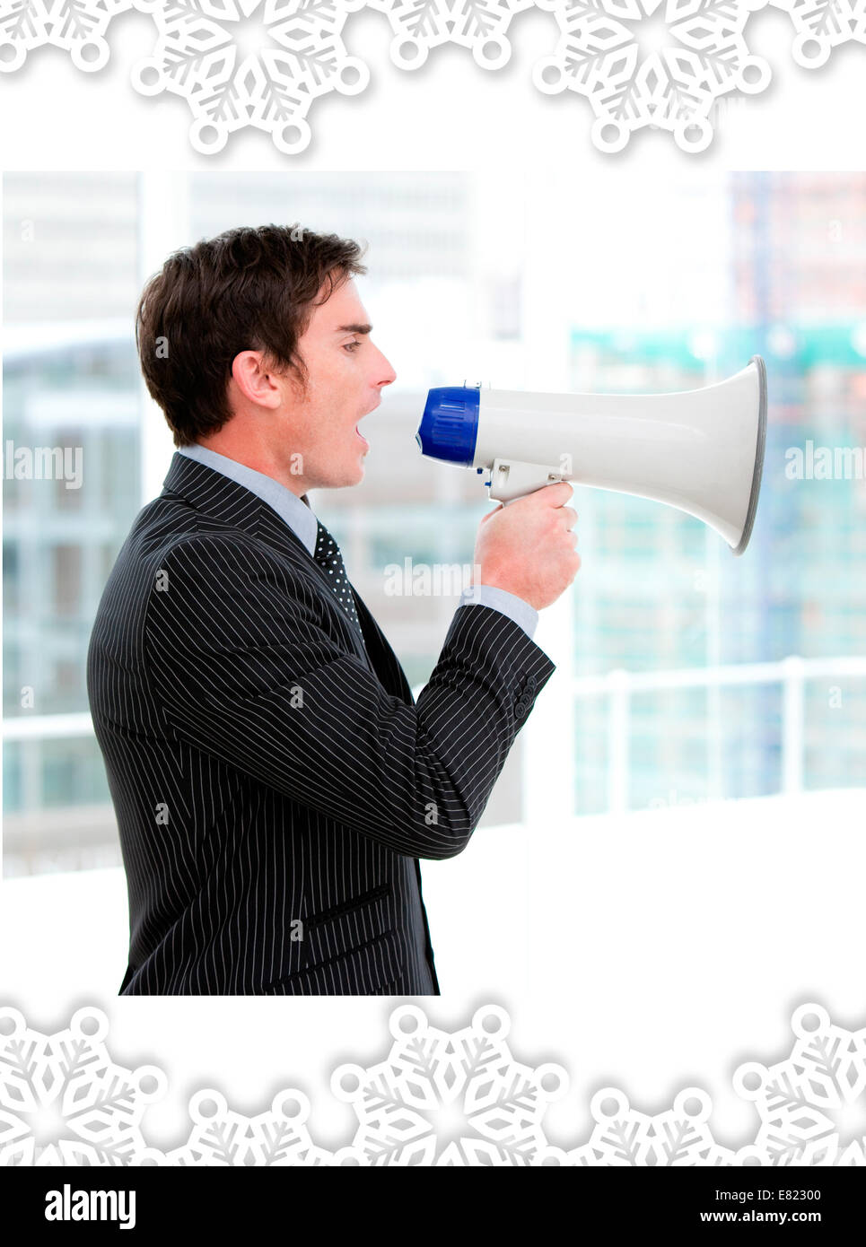 Frustrated businessman yelling through a megaphone Stock Photo - Alamy
