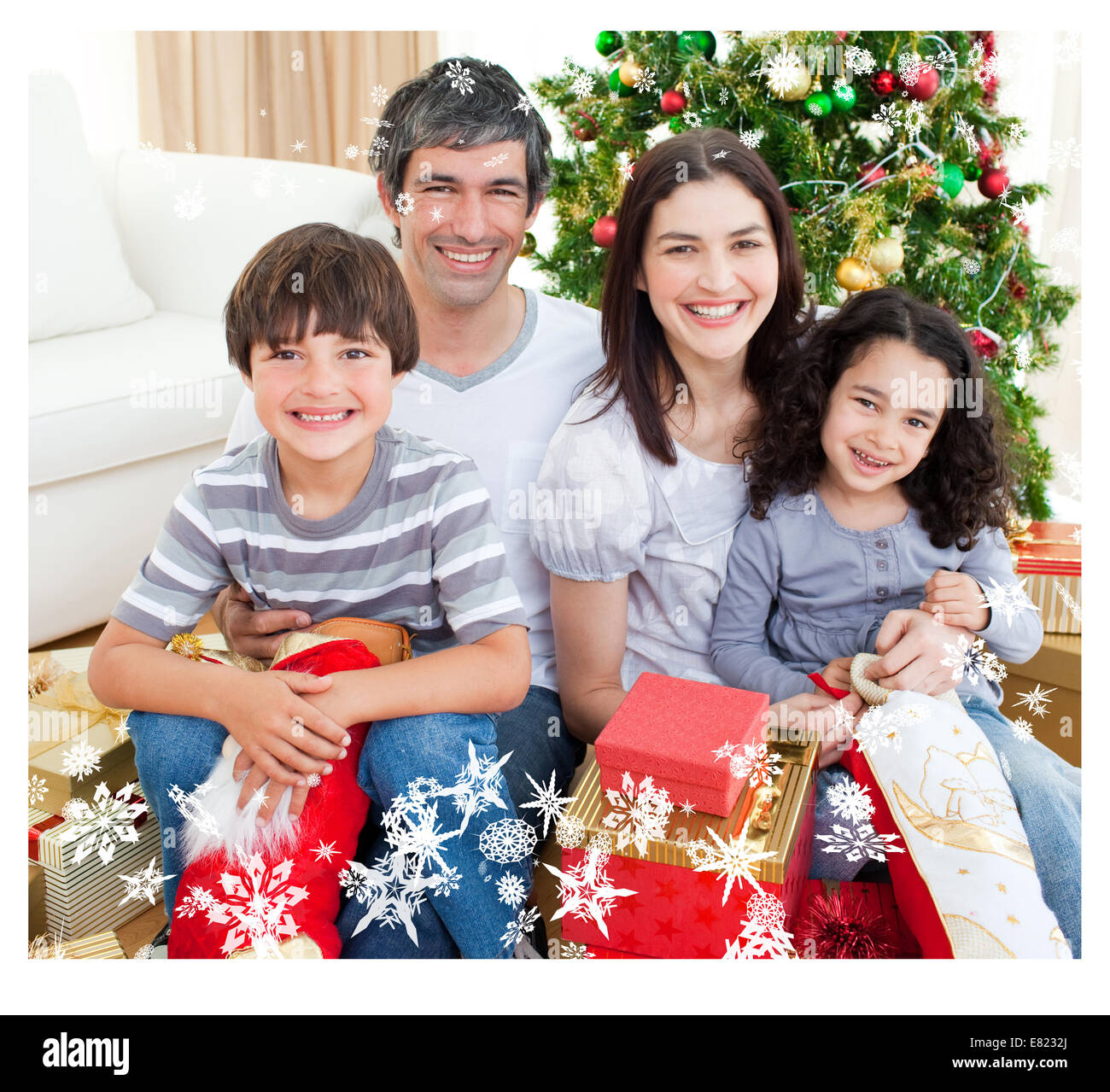 Composite image of family christmas portrait Stock Photo - Alamy