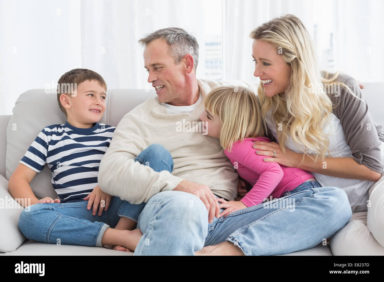 Calm family sitting on hi-res stock photography and images - Alamy