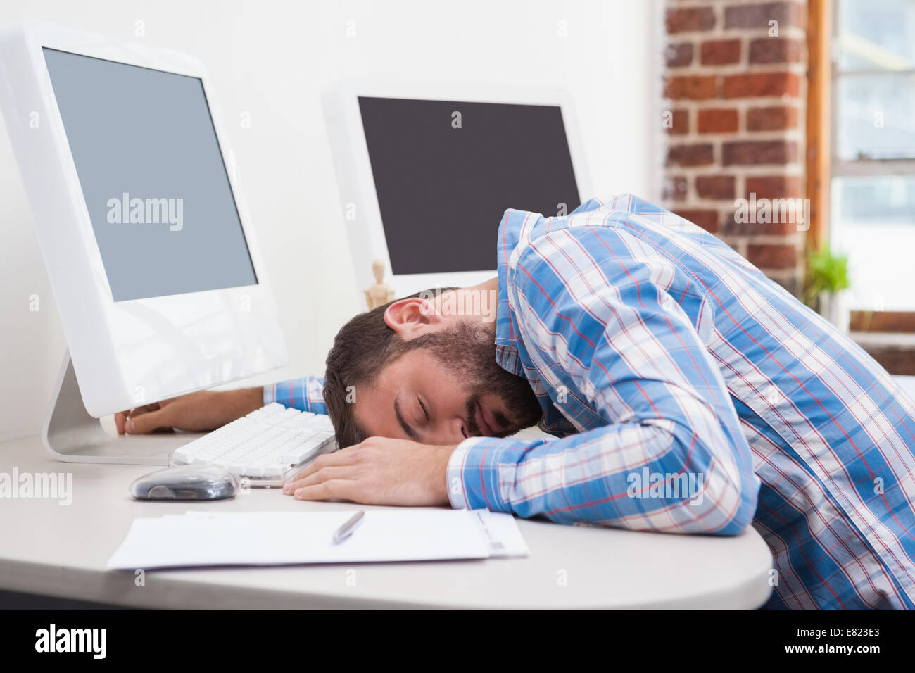 Black businessman sleeping desk hi-res stock photography and images - Alamy