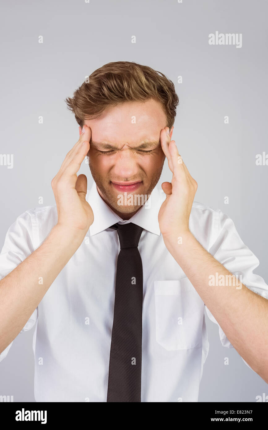 Young man businessman getting headache hi-res stock photography and ...