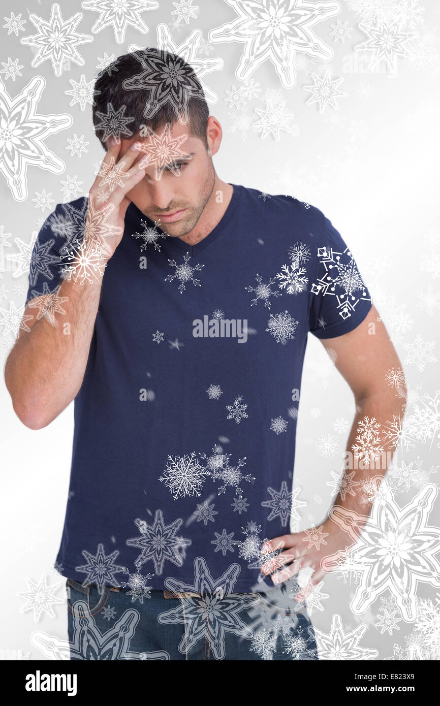Upset man holding his forehead Stock Photo - Alamy