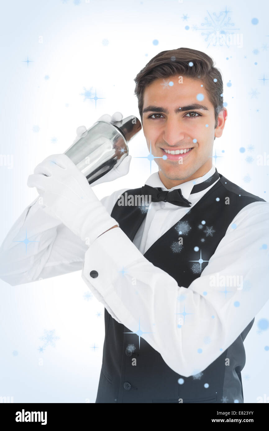 Attractive young barkeeper shaking a drink Stock Photo - Alamy