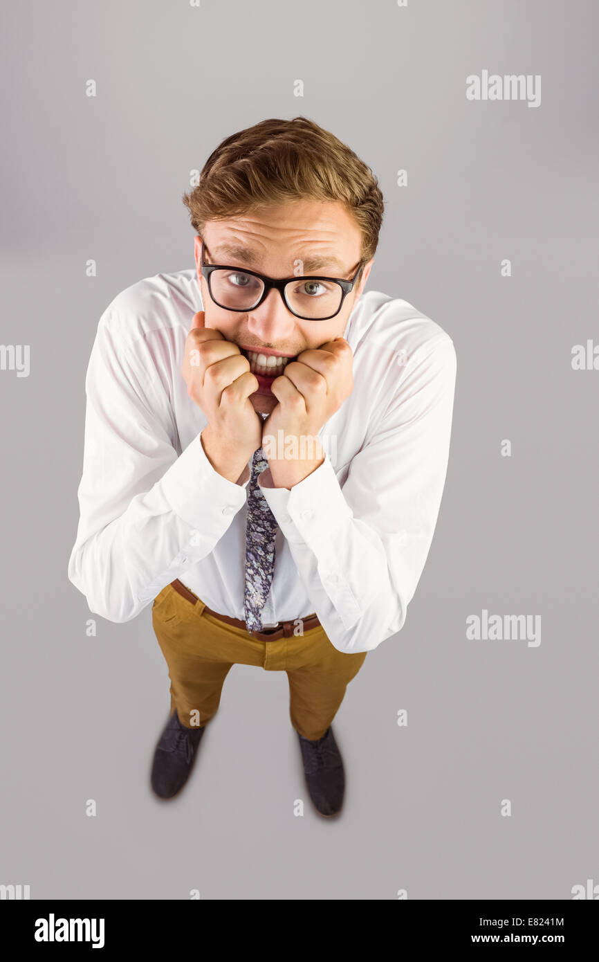 Worried young man biting hi-res stock photography and images - Alamy