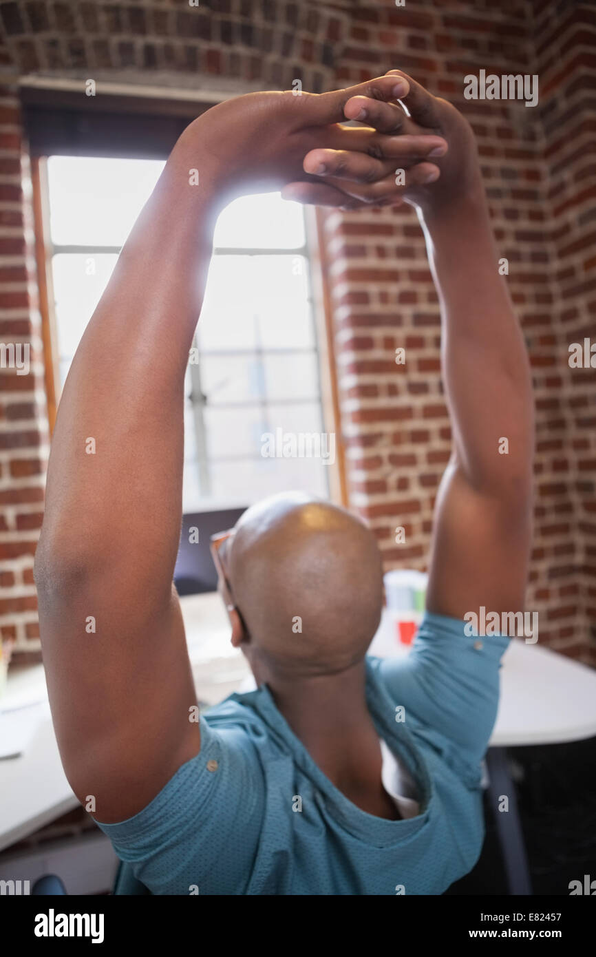 Man leaning back in chair hi-res stock photography and images - Alamy