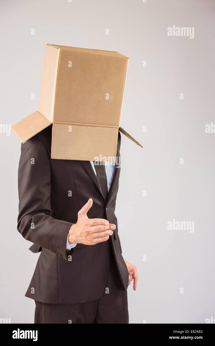 Anonymous businessman offering his hand Stock Photo - Alamy