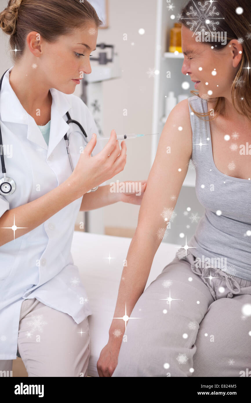 Patient receiving painful injection Stock Photo - Alamy