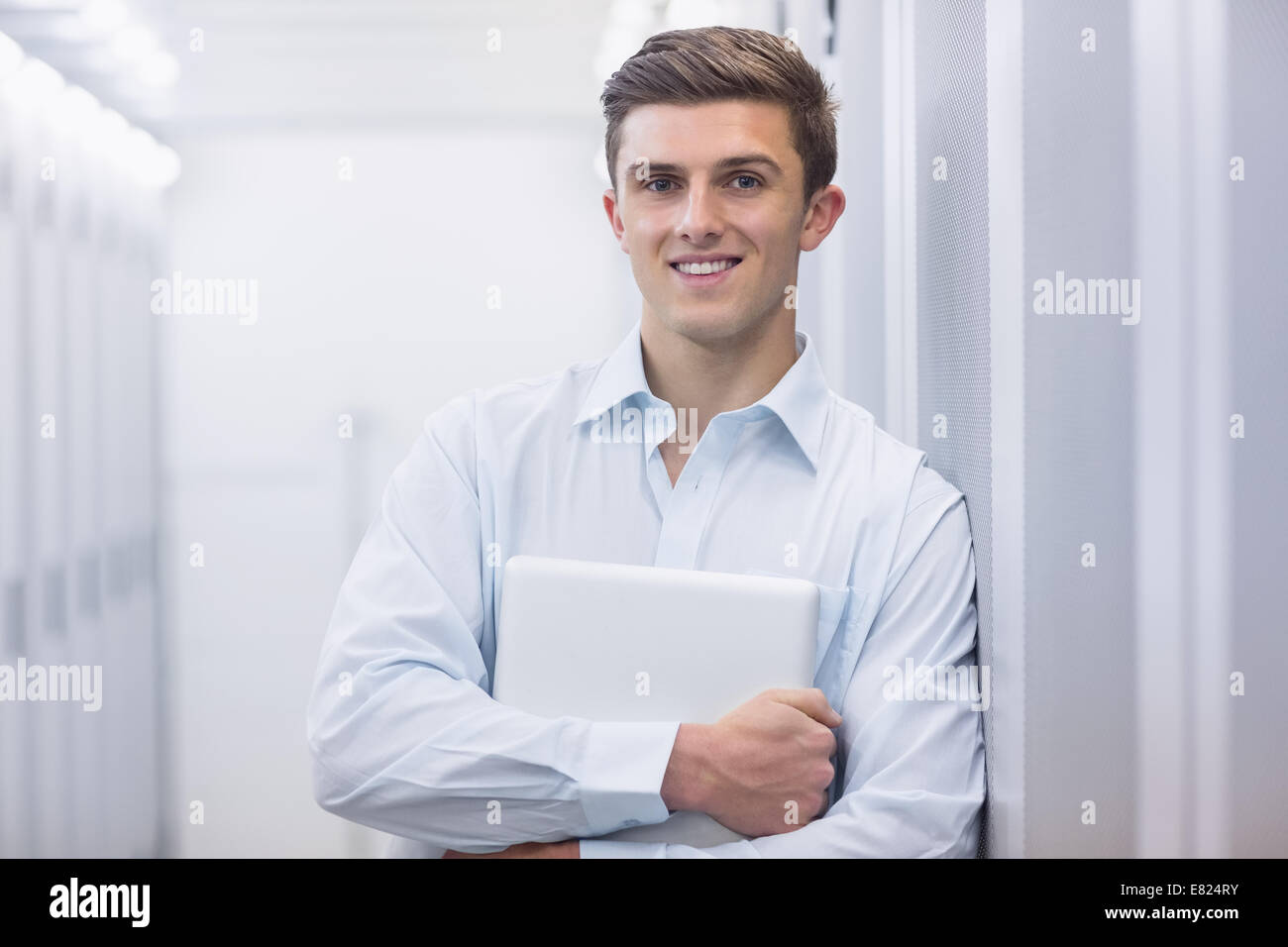 Portrait smiling male programmer working hi-res stock photography and ...