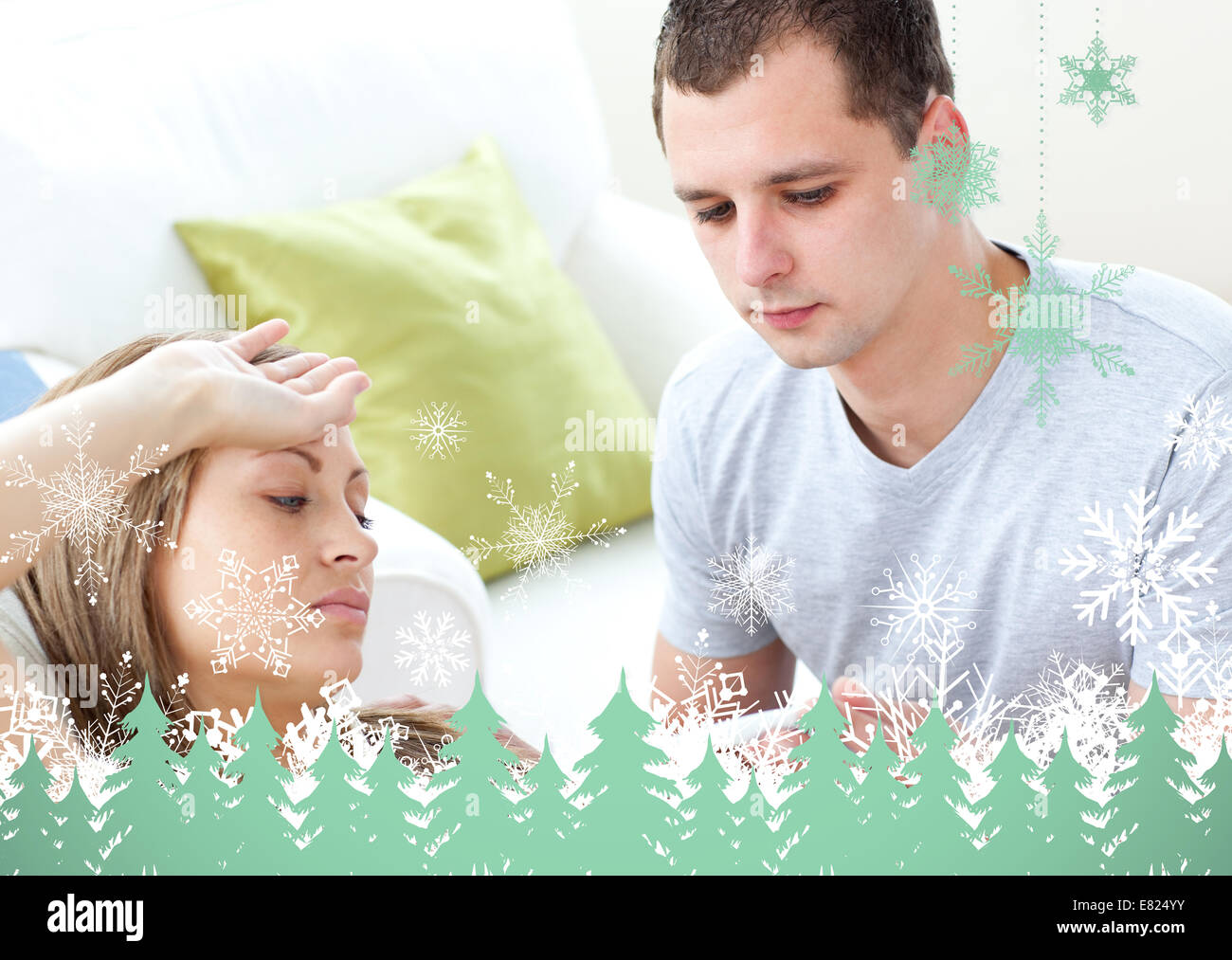 Caring man check the temperature of his sick girlfriend with a ...
