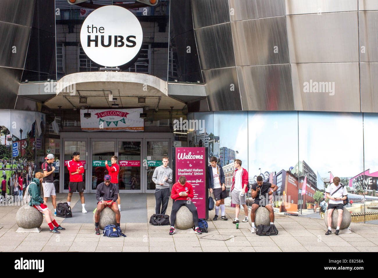 Students outside the Hubs student union building at Sheffield Hallam ...