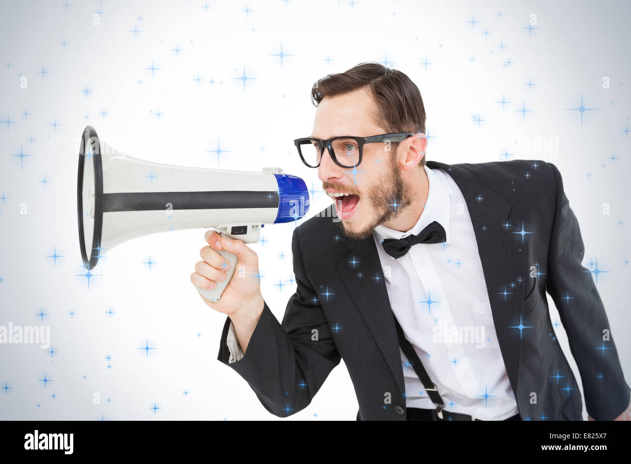 Geeky businessman shouting through megaphone Stock Photo - Alamy