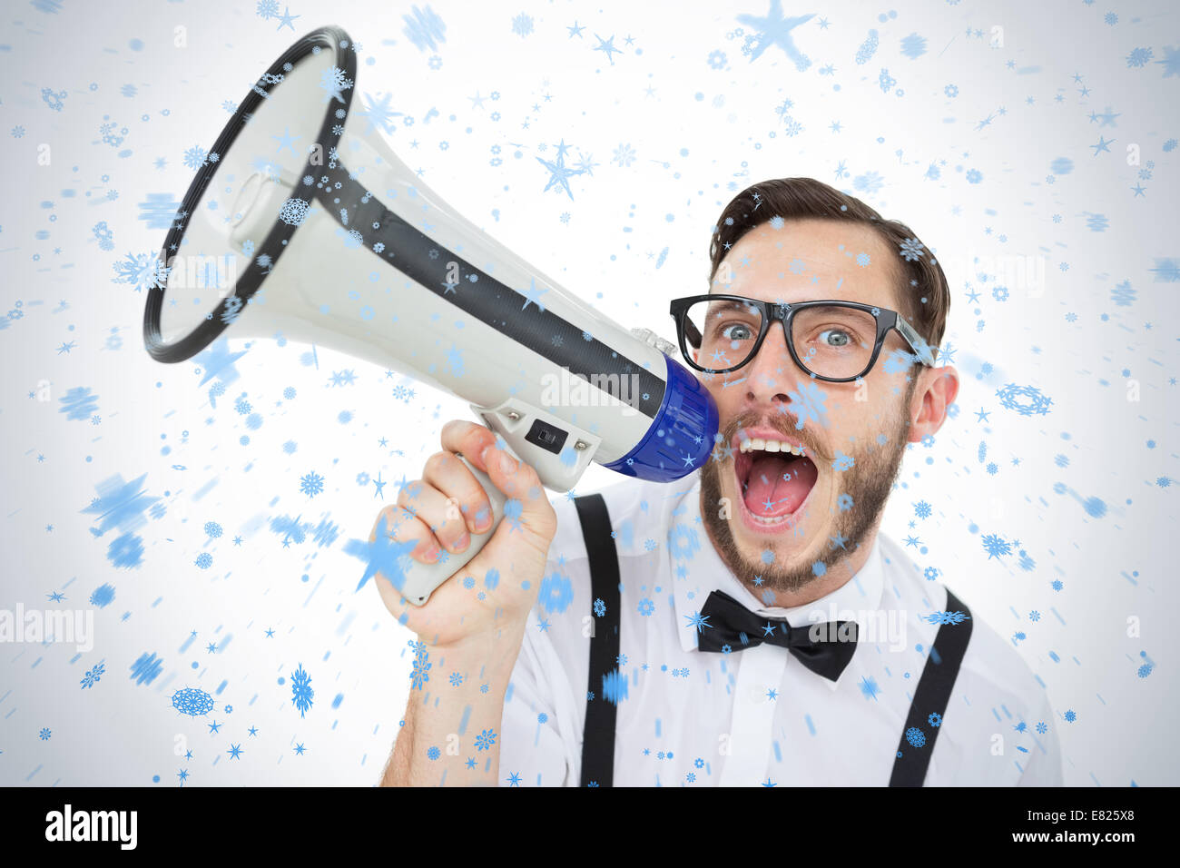 Geeky businessman shouting through megaphone Stock Photo - Alamy
