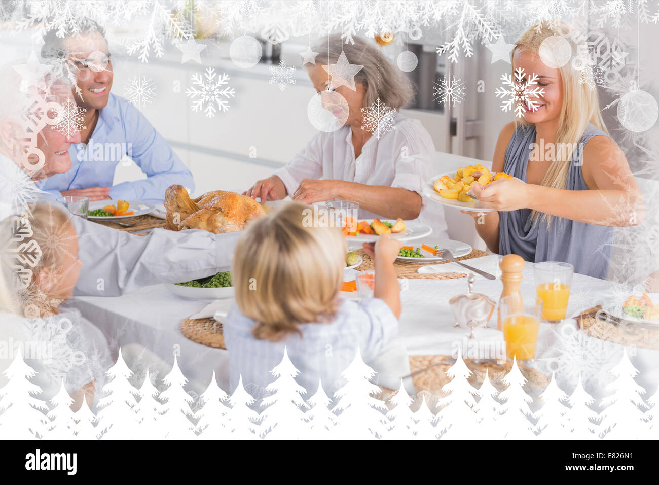 Composite image of happy family eating the thanksgiving dinner Stock ...