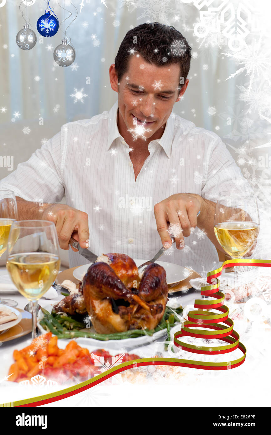 Attractive man eating turkey in christmas dinner Stock Photo - Alamy