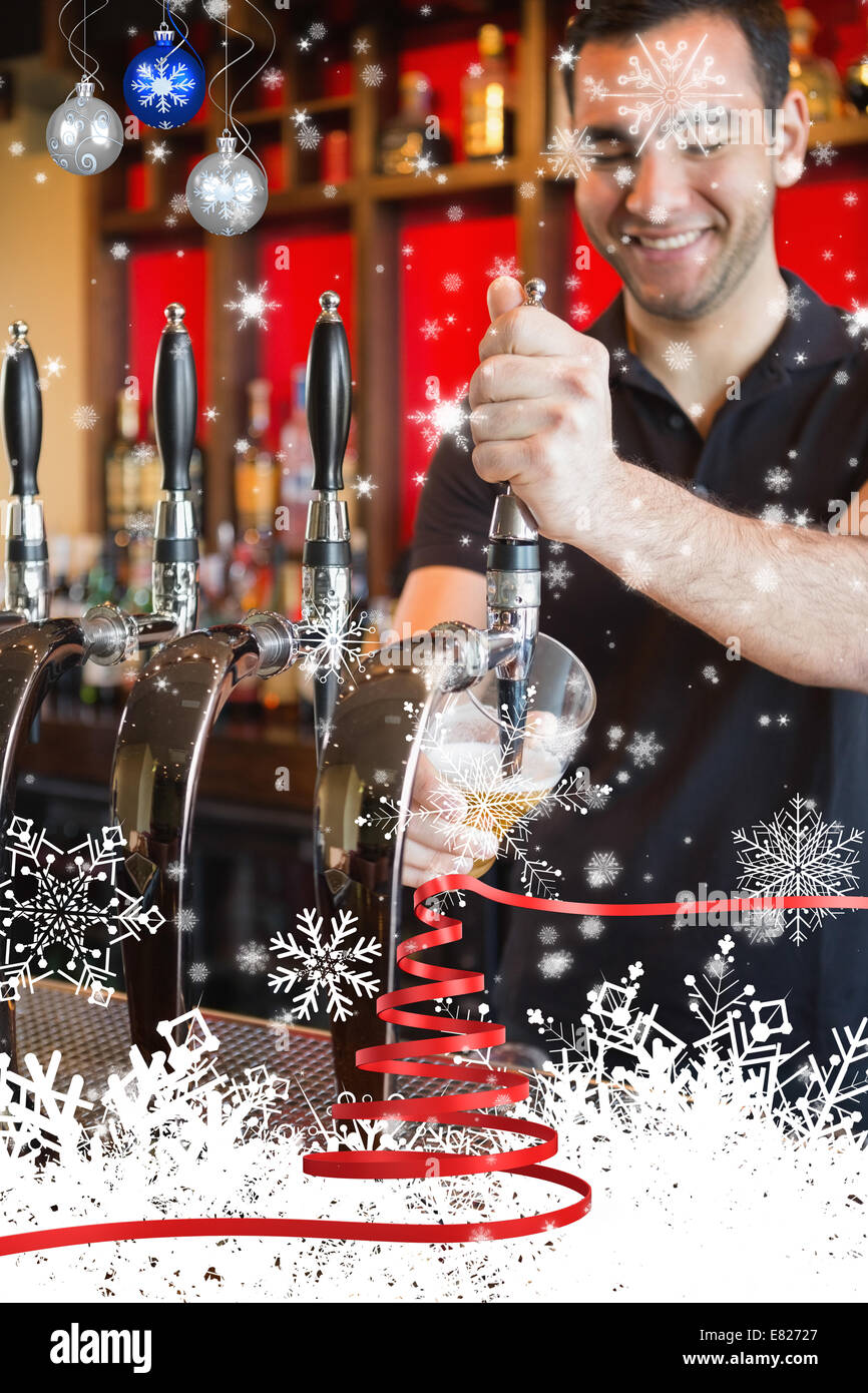 Handsome barkeeper pulling a pint of beer Stock Photo - Alamy