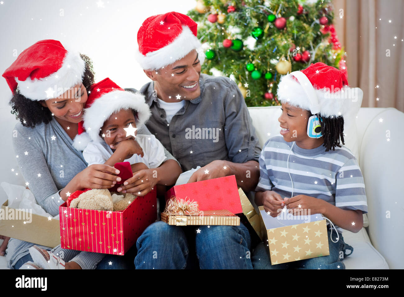 Happy family opening christmas presents Stock Photo - Alamy