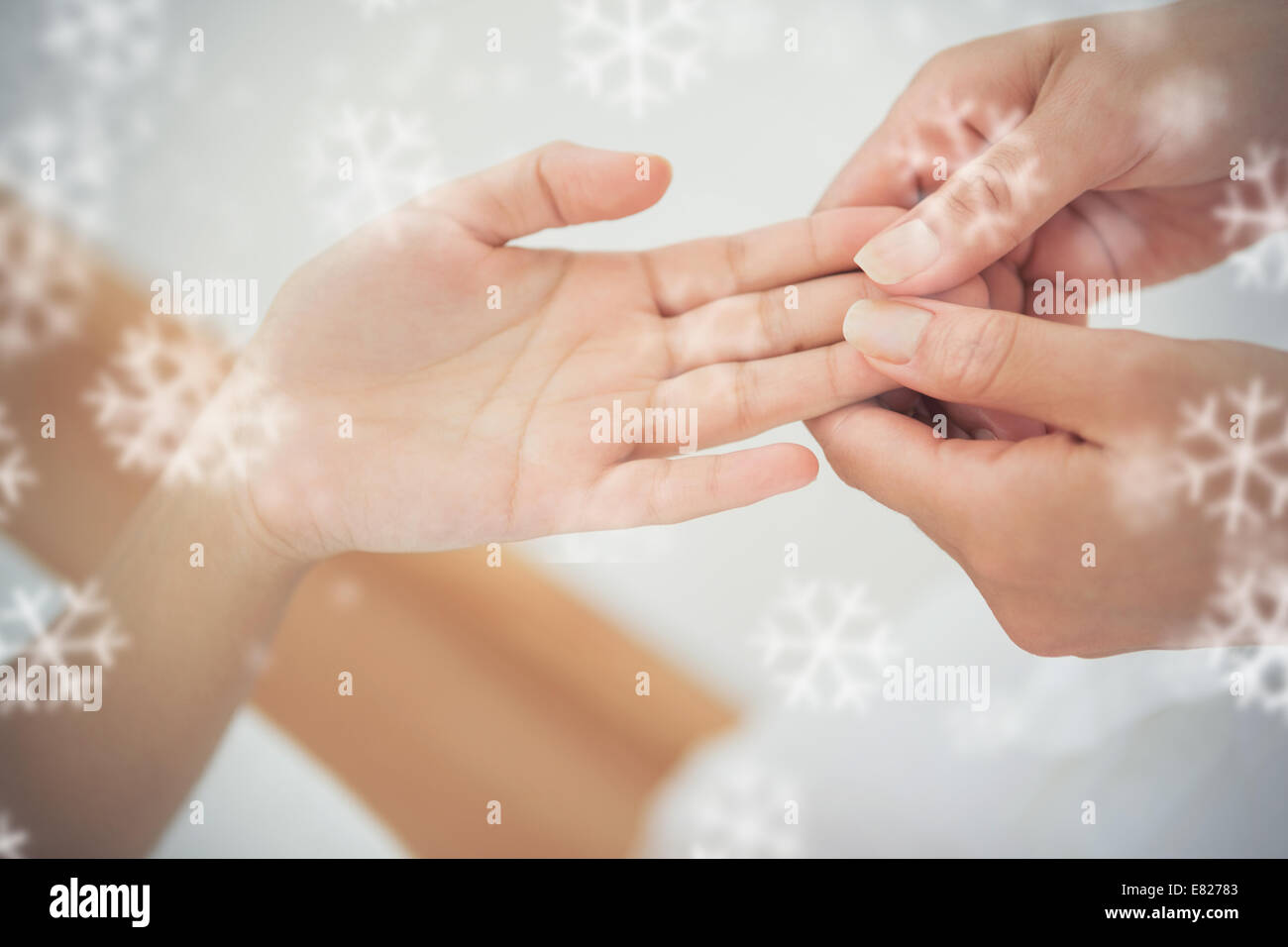 Woman receiving a hand massage Stock Photo - Alamy