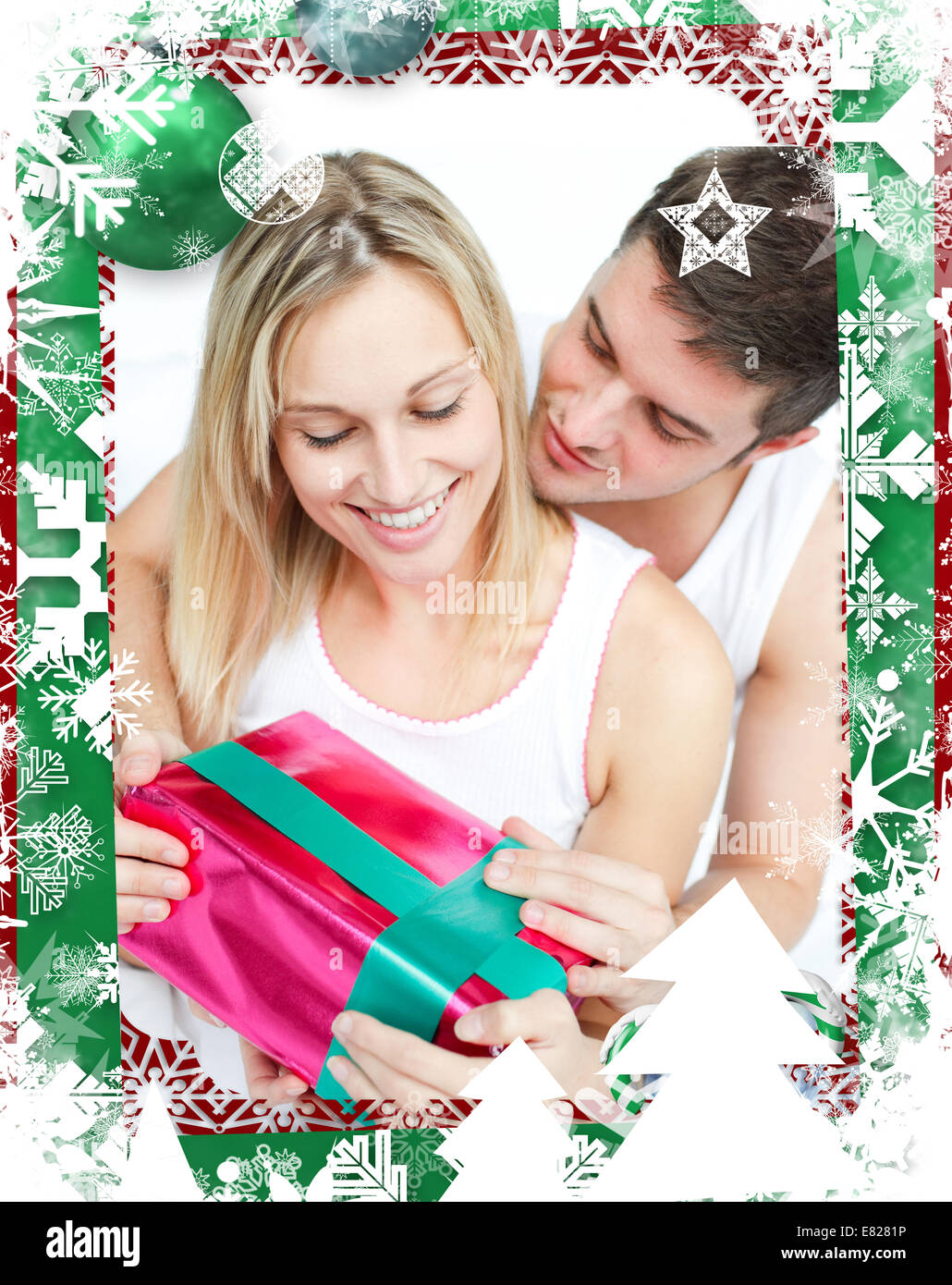 Composite image of boyfriend giving a gift to her girlfriend Stock ...