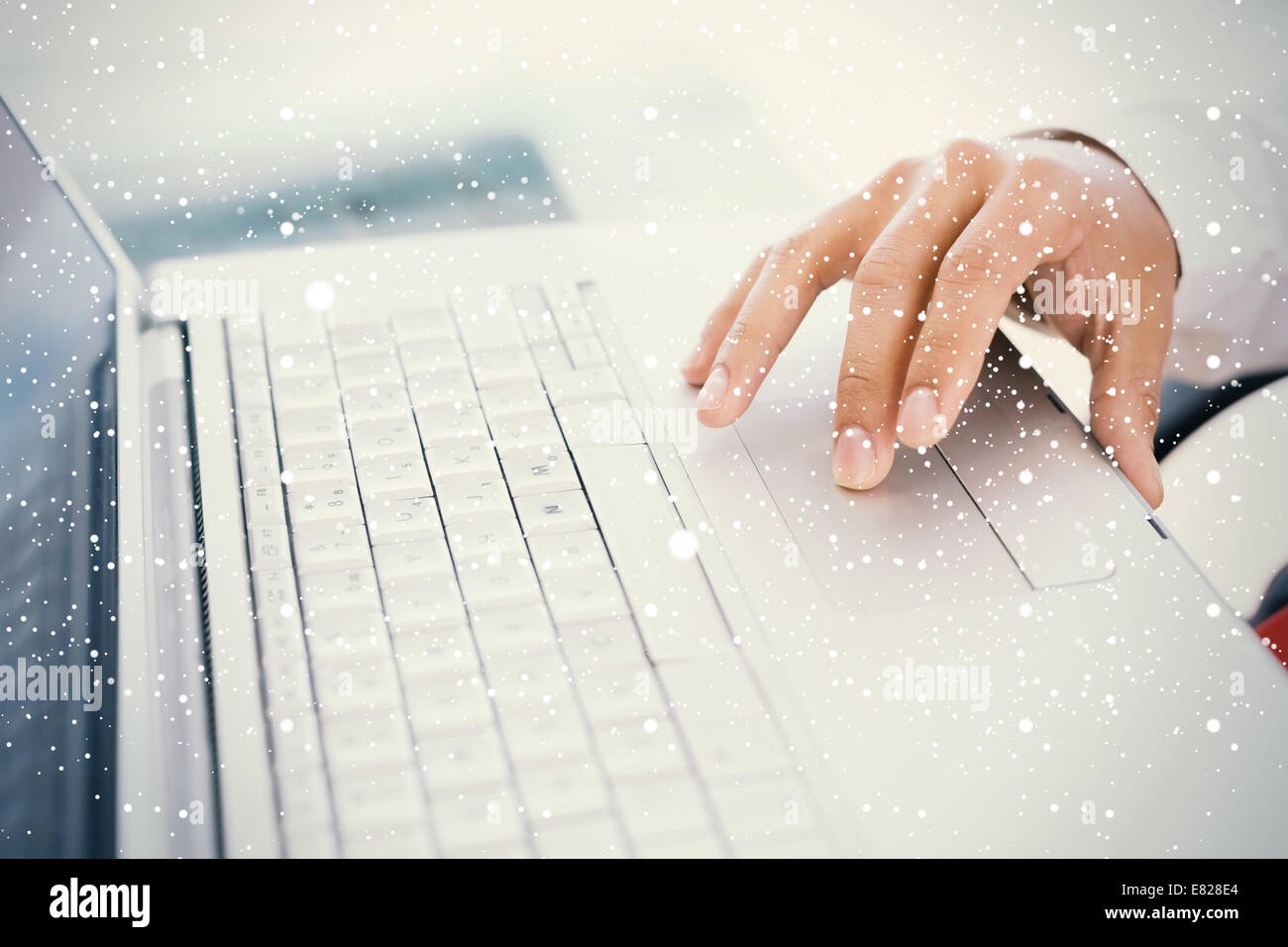 Hand using laptop at office desk Stock Photo - Alamy