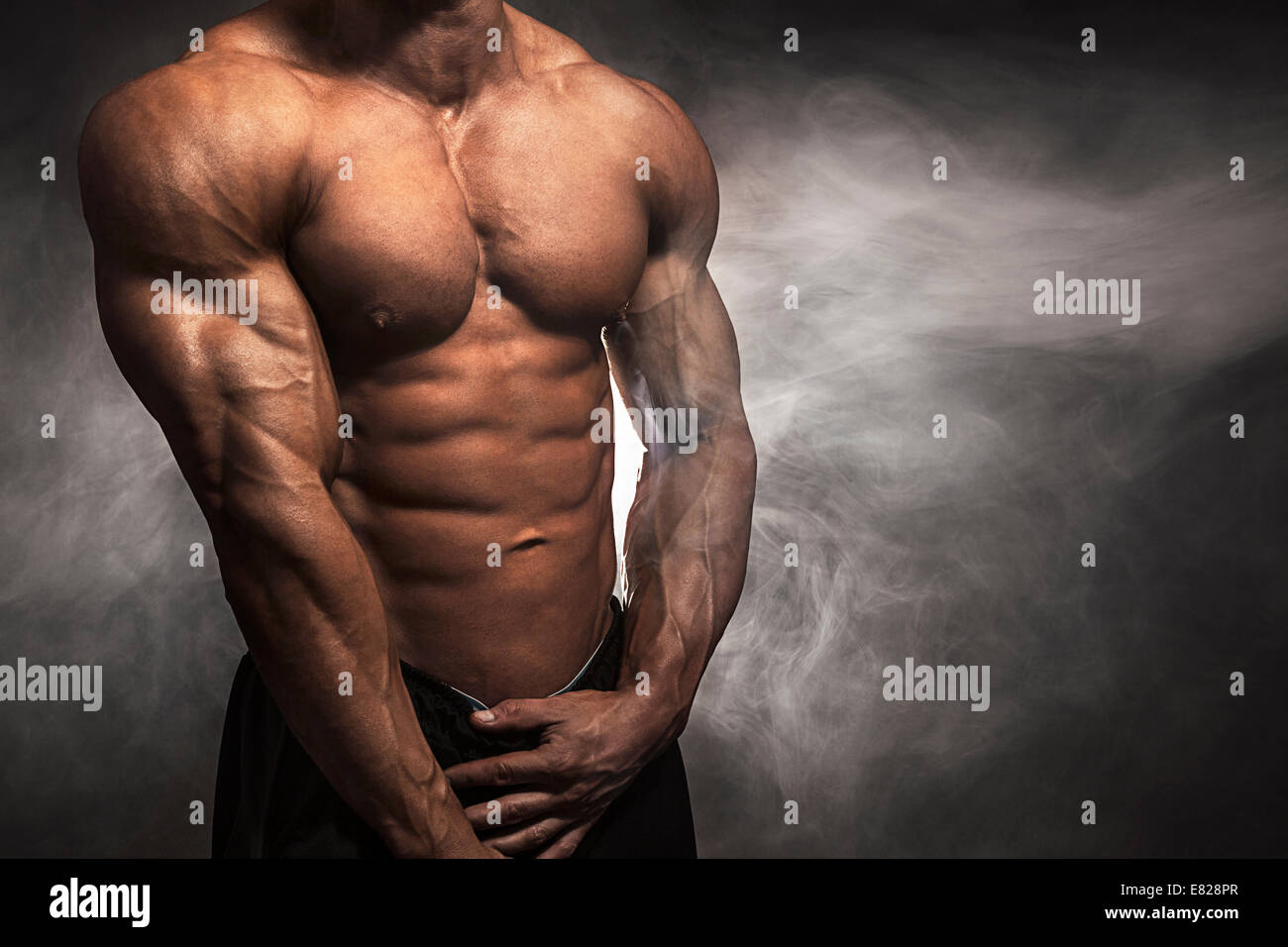 Close-up of male athlete with muscular body Stock Photo - Alamy