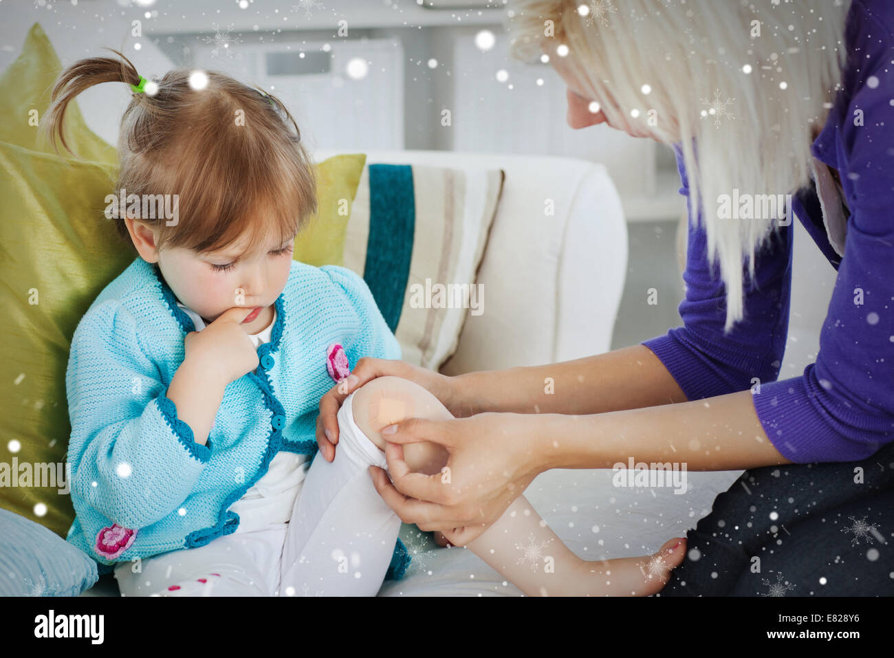 Comforting injured child hi-res stock photography and images - Alamy