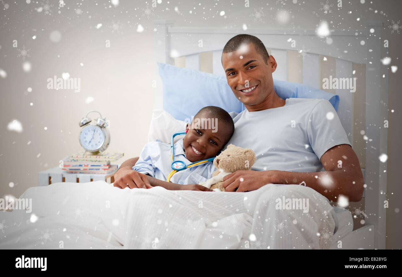 Composite image of father with his sick child Stock Photo - Alamy