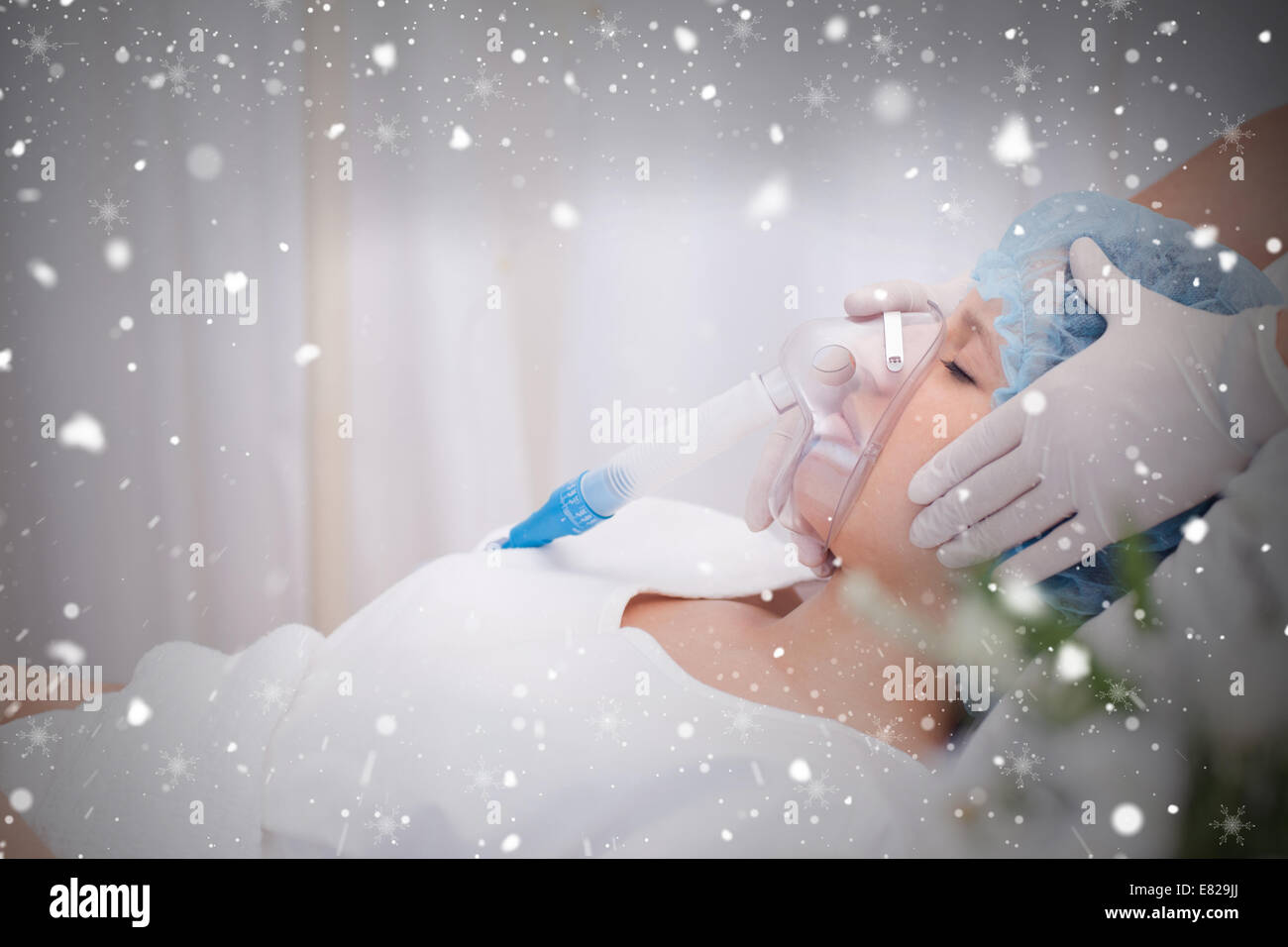 Composite image of woman about to get surgery Stock Photo - Alamy