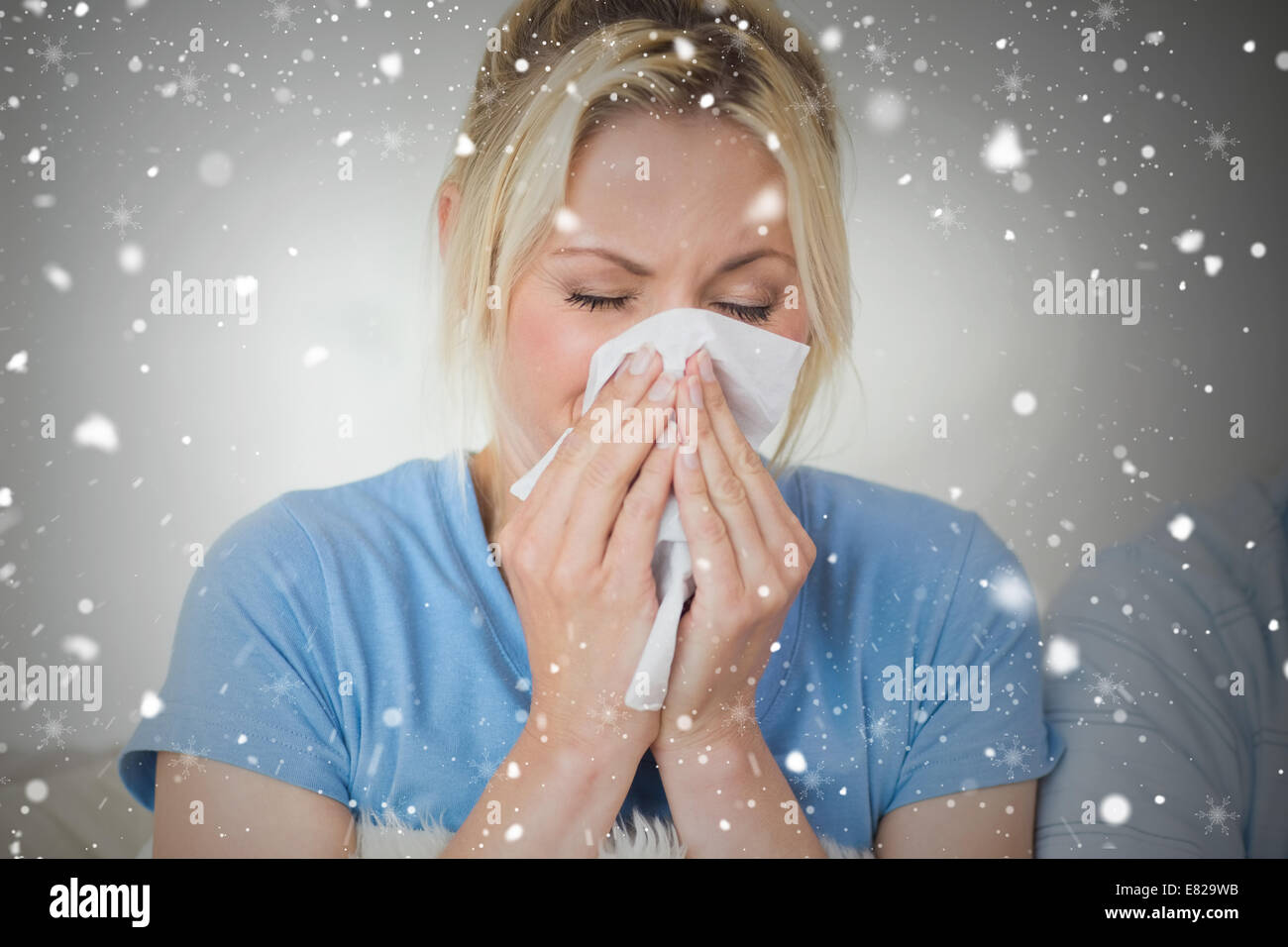 Closeup of a young woman suffering from cold Stock Photo - Alamy