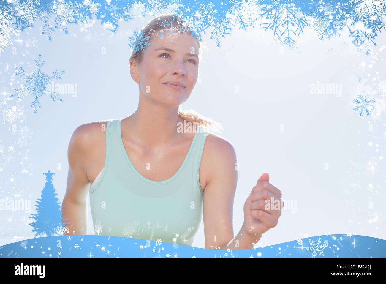 Fit woman jogging and smiling Stock Photo - Alamy