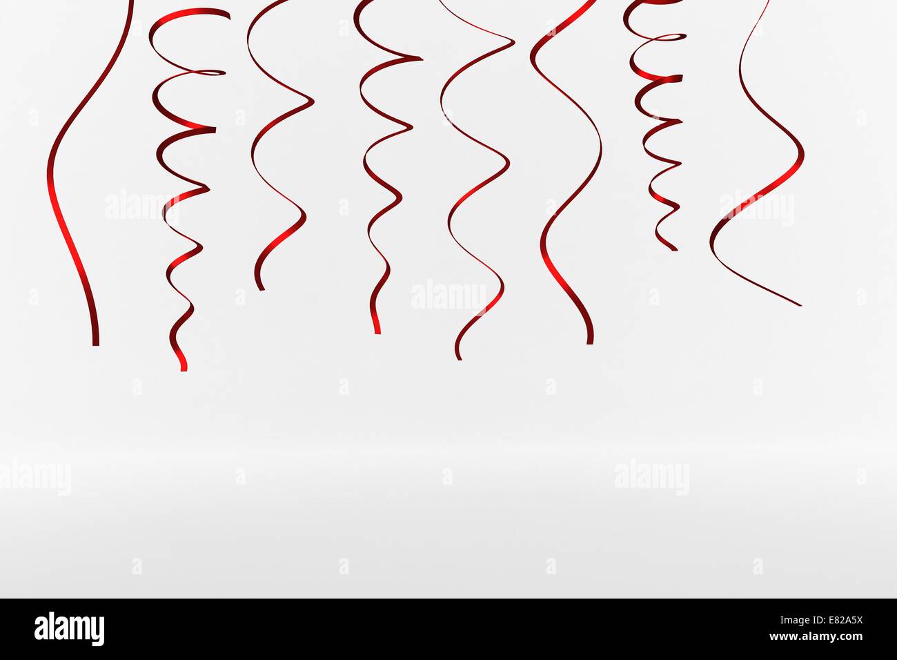 Hanging red streamer ribbon decorations hi-res stock photography and ...